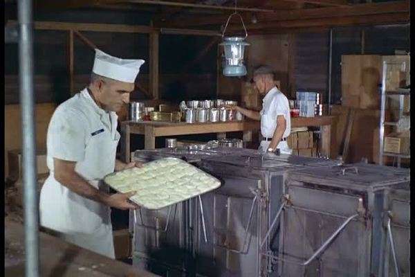 Chefs cook in a mess tent during the Vietnam War in the 1960s. - SD ...