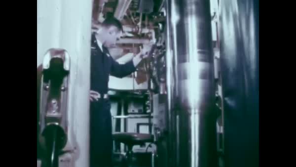 1971 - Crewmen utilize a centralized control system and a fire control ...