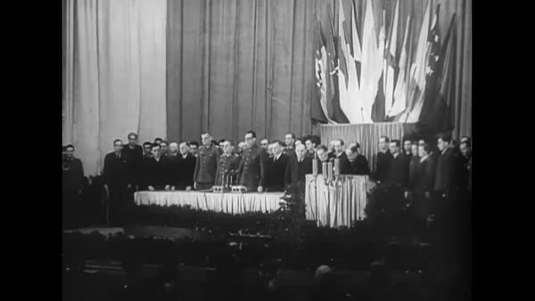 A man gives a speech in front of German commanders during World War 2 ...