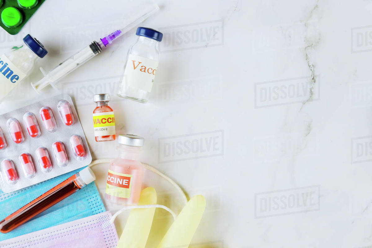 Many colorful pills and tablets medical vial bottles coronavirus ...