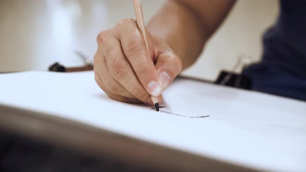 Close-up shot of a person drawing with a pencil - 4K Royalty-free Stock ...