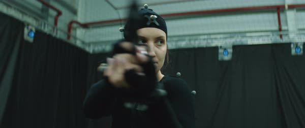 Female actor wearing motion capture suit acting as a game or animation ...