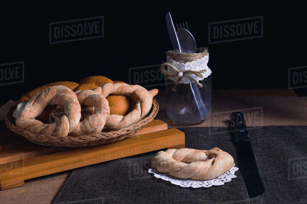 bread with thread on the table ready to cut with the knife - Royalty ...