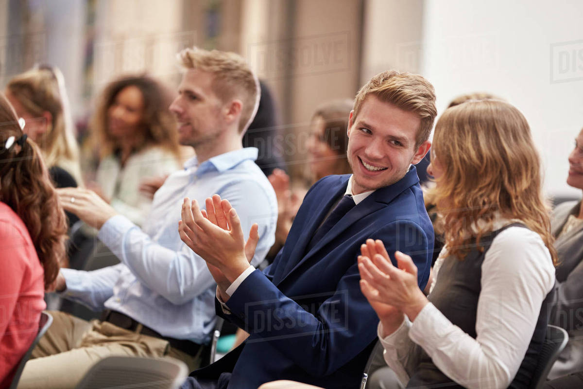 Audience applauding speaker after conference presentation - Royalty ...