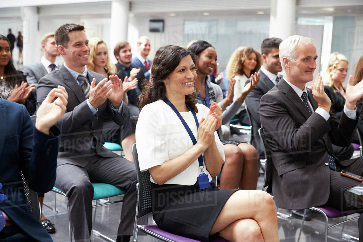 Audience applauding speaker after conference presentation - Royalty ...