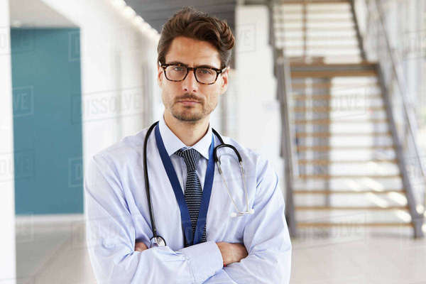 Portrait of a smiling male doctor with stethoscope, close up - Stock ...