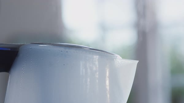Close Up Of Steam Coming Out Of Spout Of Boiling Kettle - Stock Video ...