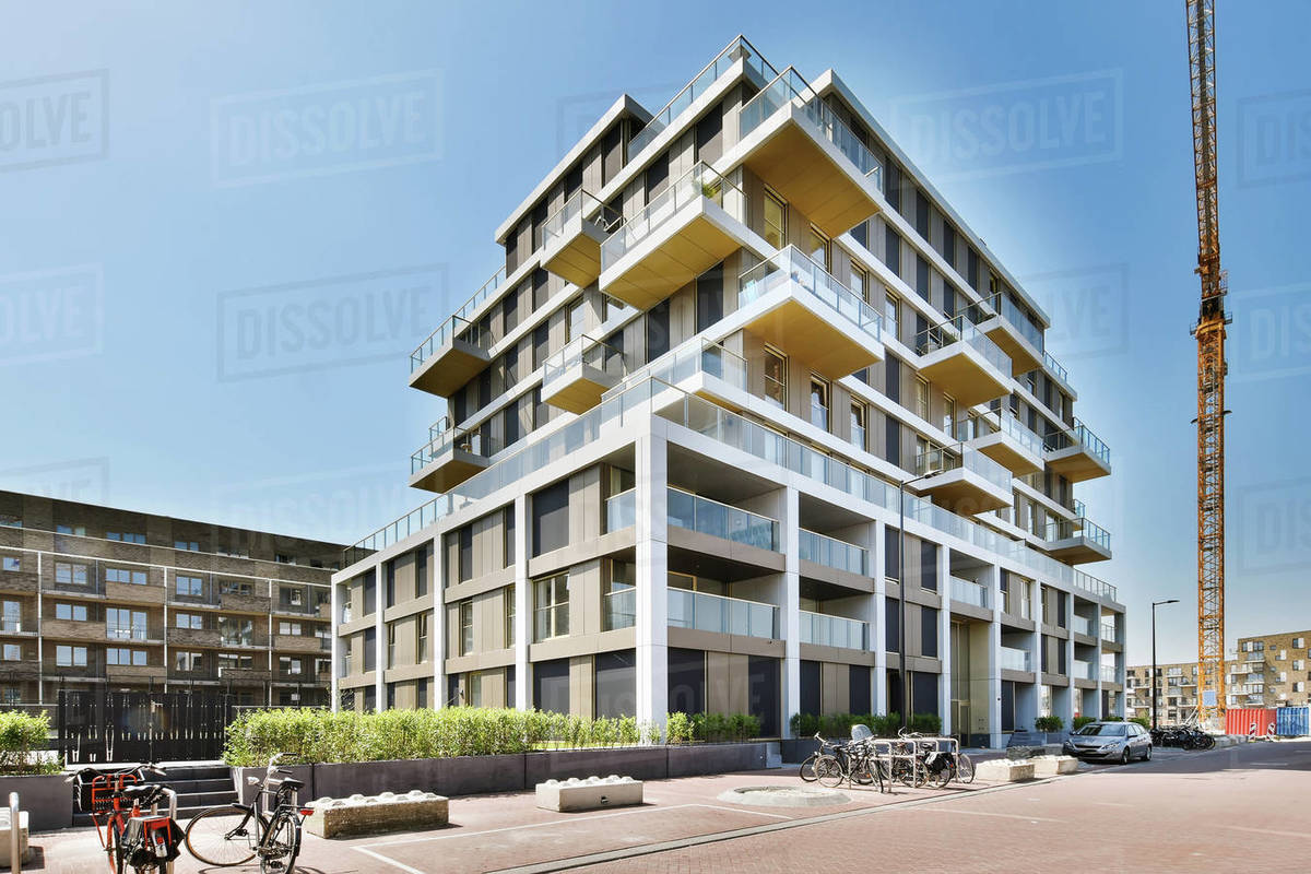 Pretty view of residential building with parking - Royalty-free Stock ...