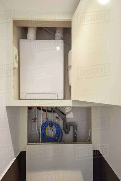 An electric dashboard with cables in a small room - Stock Photo - Dissolve