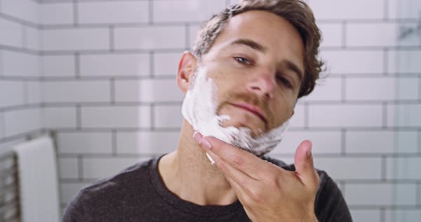 Man, face and shaving cream with hygiene and grooming, beauty and ...