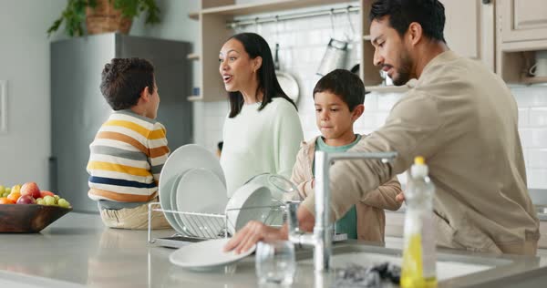 Teamwork, kids learning or parents washing dishes with support for ...