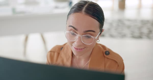 Working, computer and business woman in office looking at screen ...