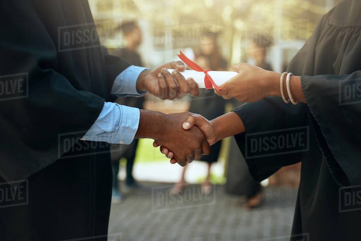 Handshake, graduation and hands with certificate at a college for ...