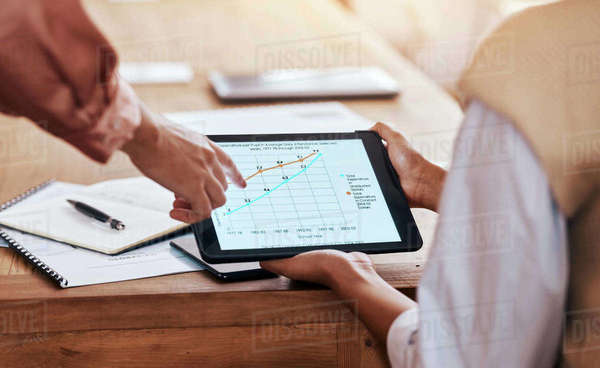 Business people, hands and tablet pointing to data, graph or chart for ...
