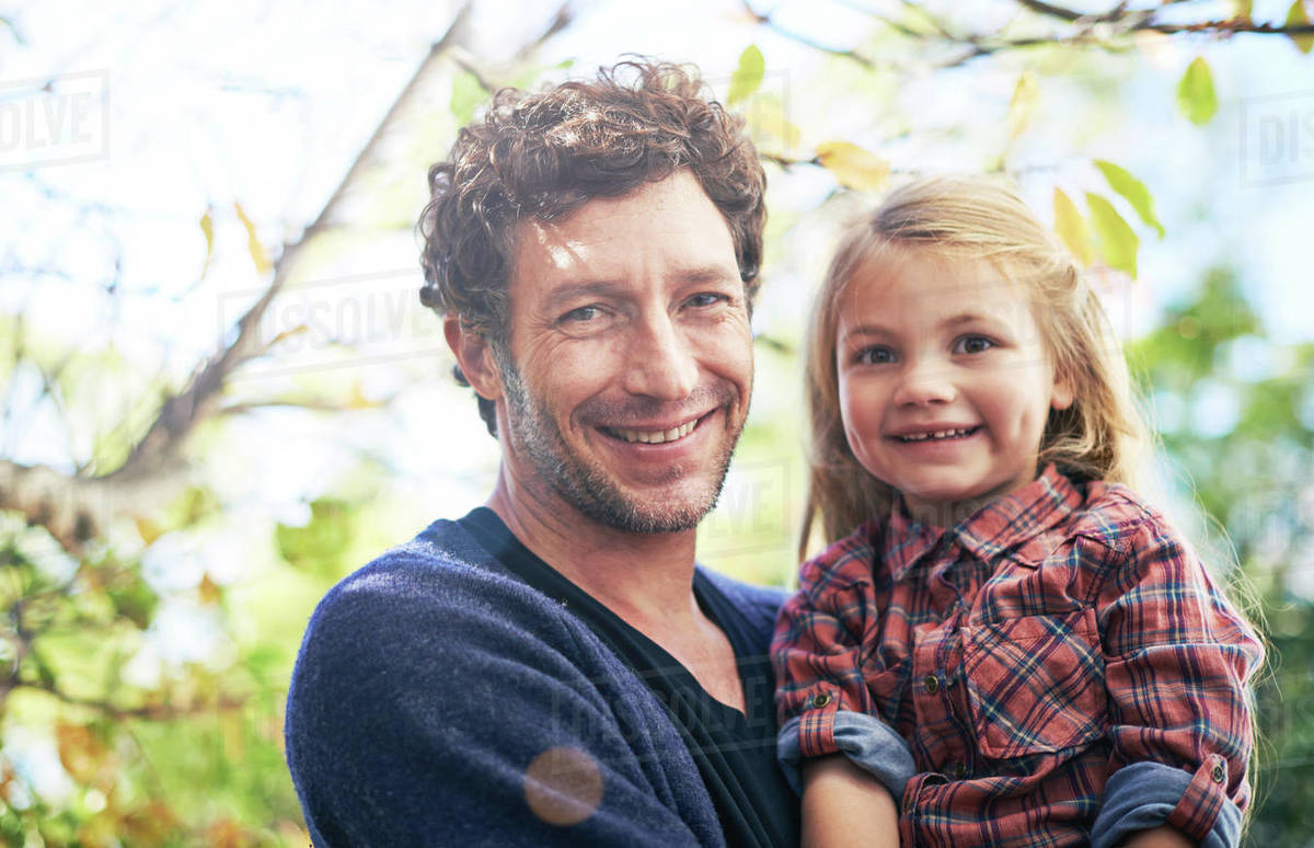 Happy, nature and portrait of father and daughter in backyard garden ...