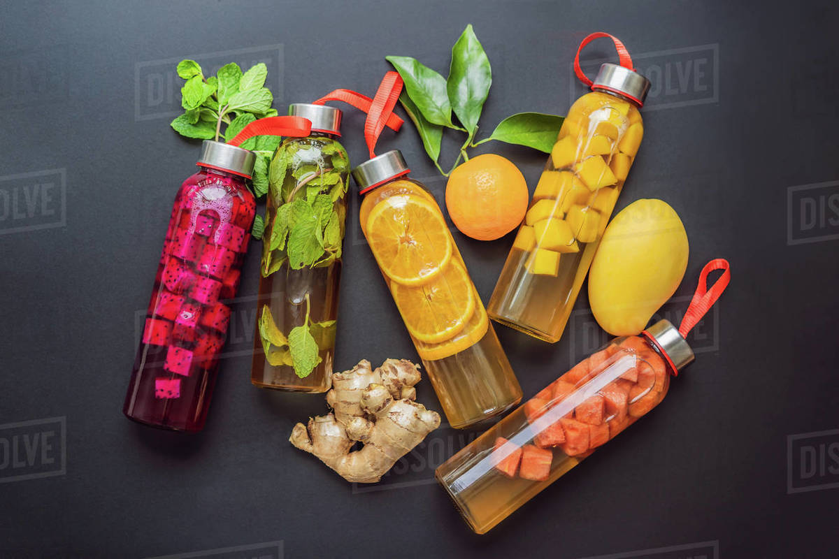 Kombucha with various fruits arranged in the form of a rainbow ...
