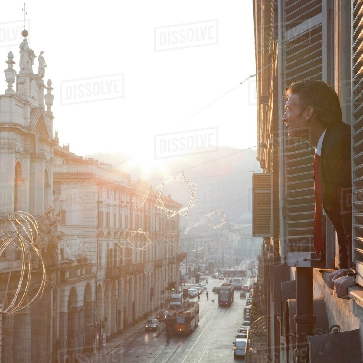 Man leaning out the window of his room - Royalty-free Stock Photo ...