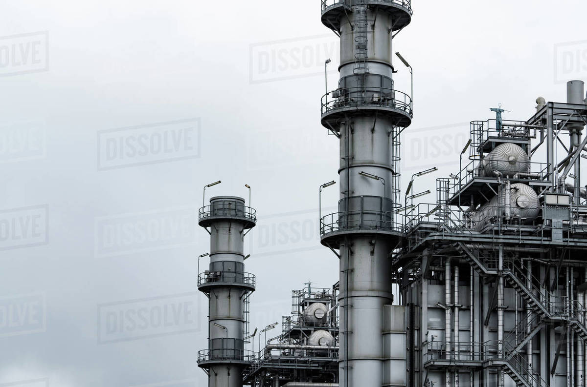 Gas turbine electrical power plant. Natural gas tank. Chimney tower ...