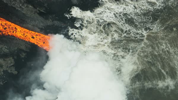 Aerial view river of volcanic magma flowing from active volcano to the ...