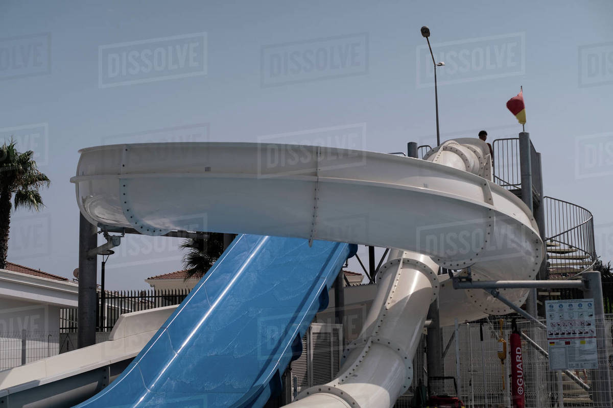 Inflatable water slides provide aquatic fun at a water park. Amusement ...