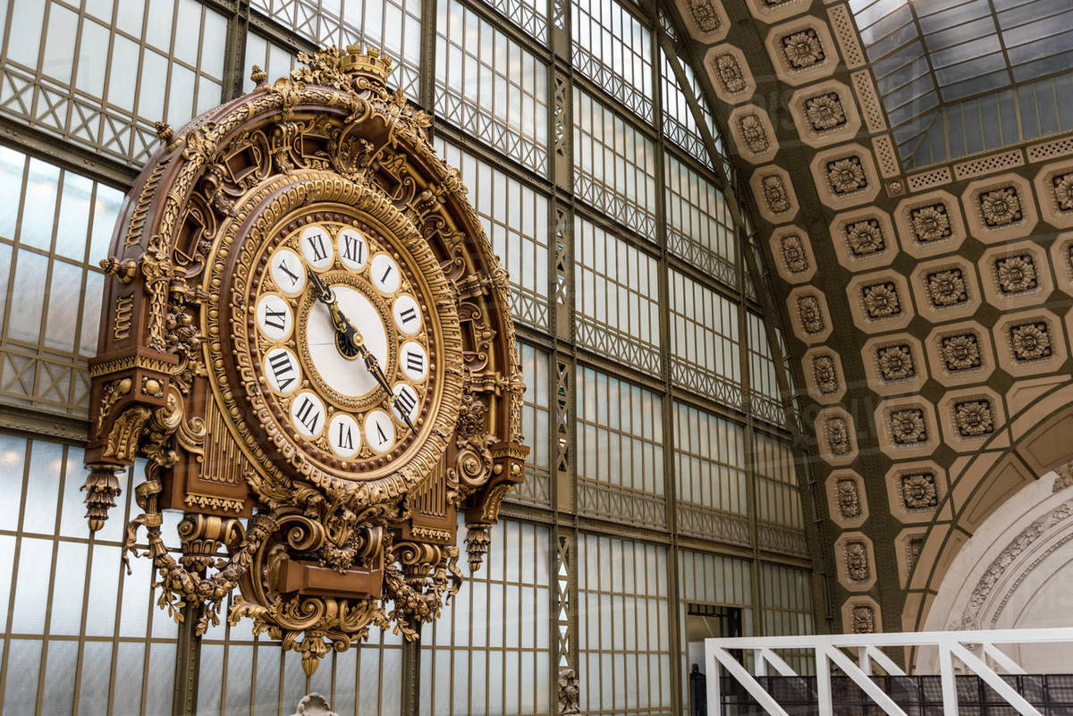 PARIS, FRANCE - Ornate clock at the main hall of famous museum d'Orsay ...