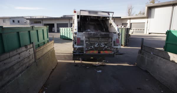 Dumping Trash From Garbage Truck At Recycling Factory - Stock Video ...