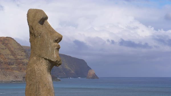 DRONE, COPY SPACE: Large volcanic sculpture with human features faces ...