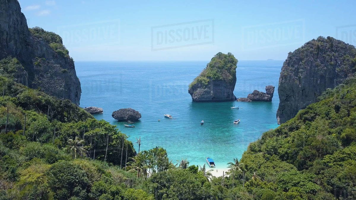 AERIAL: Cool shot of tourists enjoying their summer vacation in ...