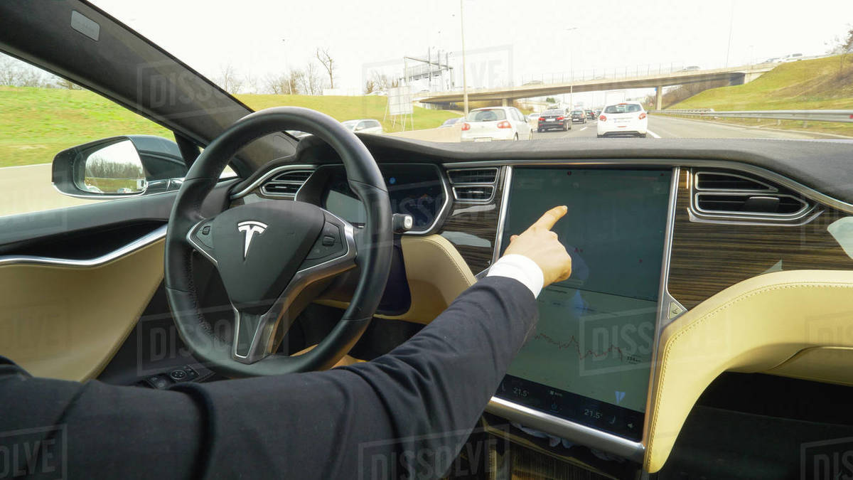 AUTONOMOUS TESLA CAR, MARCH 2018 - CLOSE UP: Unrecognizable stylish ...