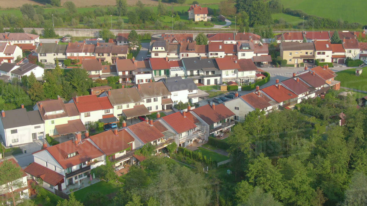 DRONE: Flying high above luxury terraced houses and the empty asphalt ...