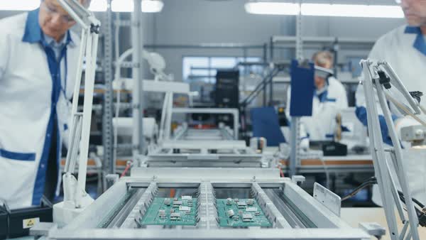 Time Lapse of Electronics Factory Workers Assembling Circuit Boards by ...