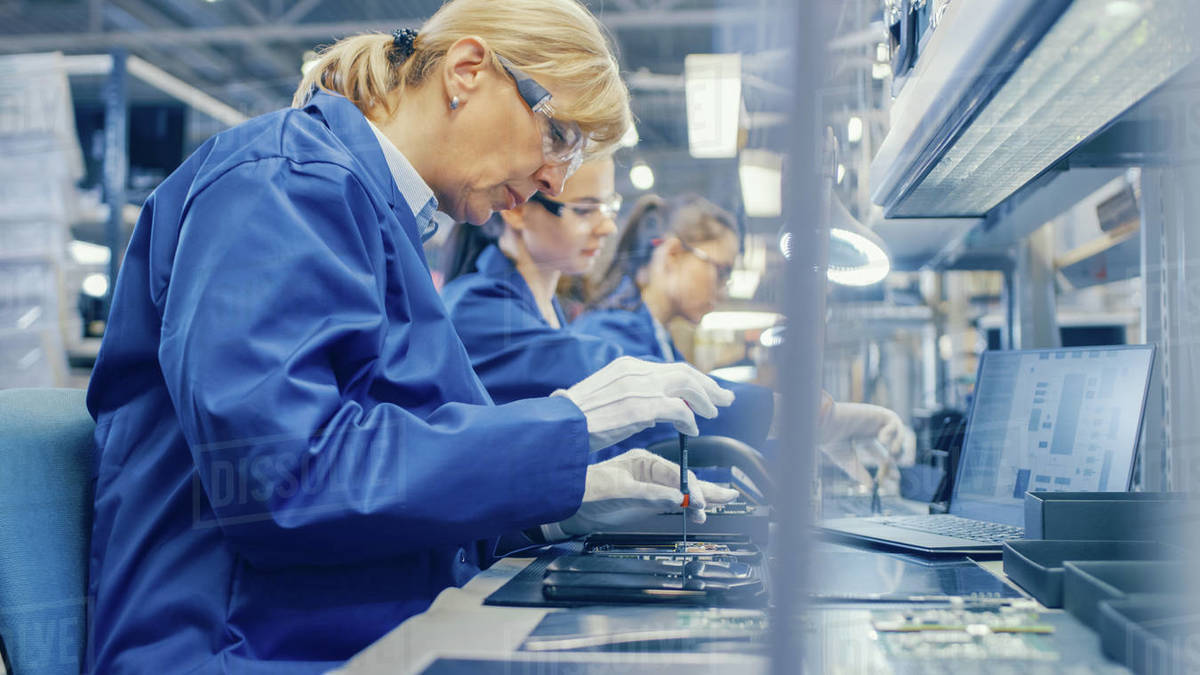 Female Electronics Factory Worker in Blue Work Coat and Protective ...