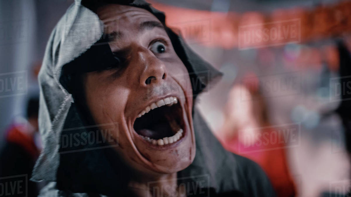 Halloween Costume Party: Terrifying Screaming Death. In the Background ...