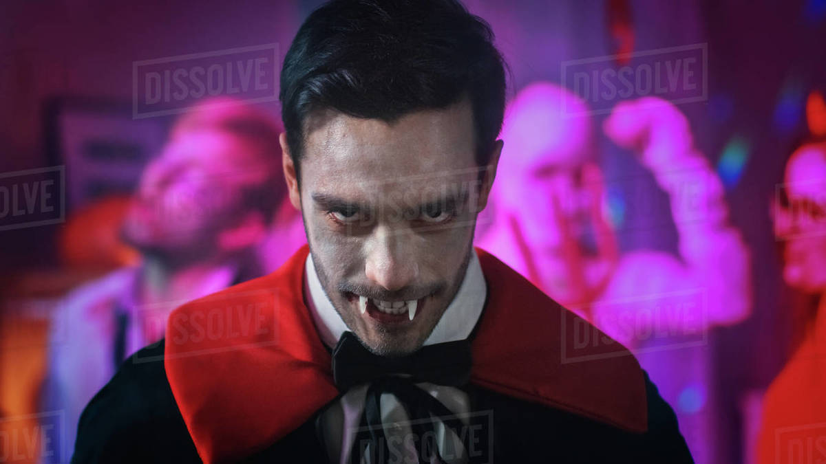 Halloween Costume Party: Portrait of Count Dracula Smiling Creepily ...