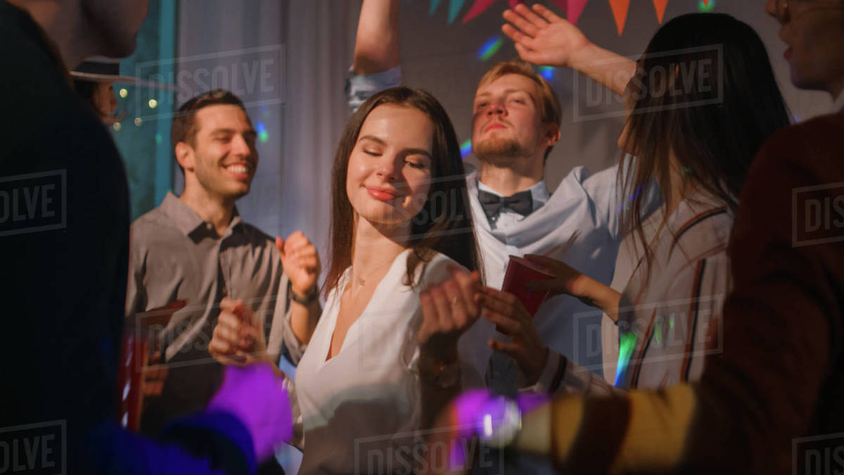 A group of students dance together at a college party. - Royalty-free ...