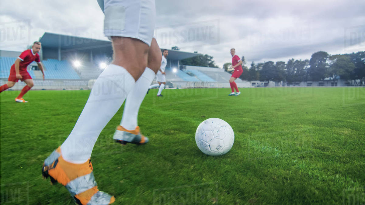 Low Angle Shot of a Professional Soccer Player Before Kicking the Ball ...