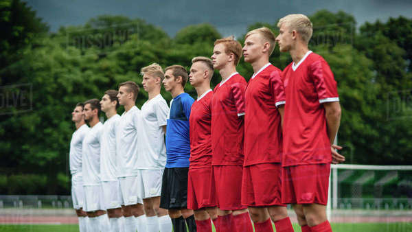 Two Professional Soccer Teams Posing for a Photo and Standing in Line ...