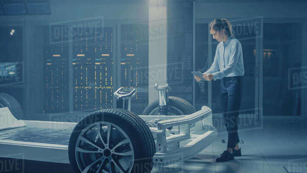 Automobile Engineer Working on Electric Car Chassis Platform, Using ...