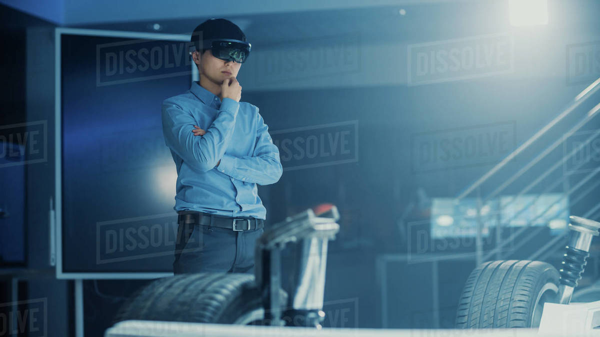 Automotive Engineer Working on Electric Car Chassis Platform, Using ...