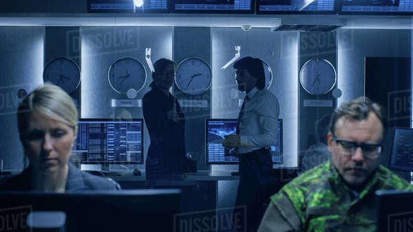 Government Cybersecurity Agency Professionals Working on Personal ...