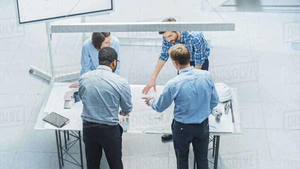 In the Busy Engineering Facility: Diverse Group of Engineers ...