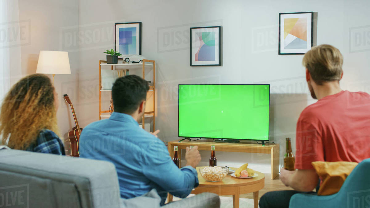 Diverse Group of Friends Sitting on a Couch at Home, Watch Green Chroma ...