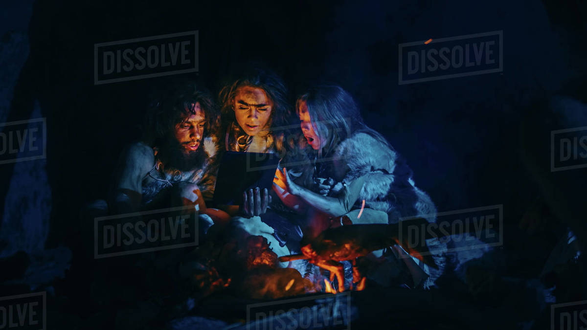 Tribe of Prehistoric, Primitive Hunter-Gatherers Wearing Animal Skins ...