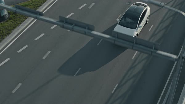 A modern luxury white electric SUV driving on urban highway - Stock ...