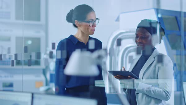 Industrial Engineer Talks with Project Supervisor, They Use Digital ...