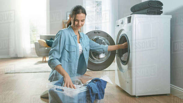 Beautiful and Happy Brunette Young Woman Comes Towards the Washing ...
