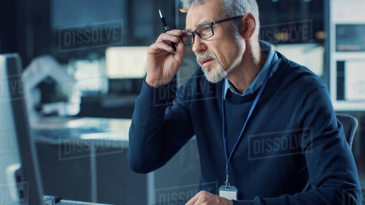 Portrait of Handsome Confused Middle Aged Engineer Wearing Glasses ...