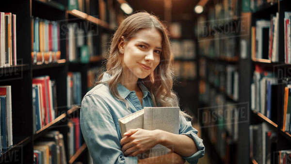 University Library Study: Portrait of a Smart Beautiful Girl Holding ...