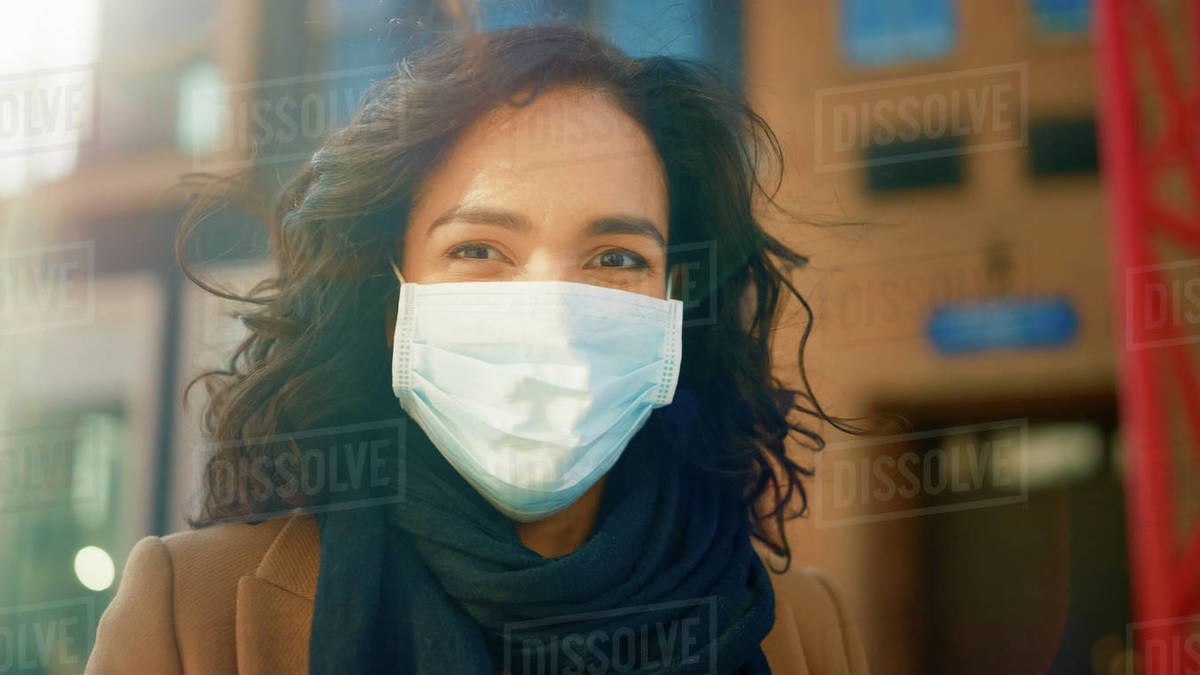 Portrait of a Beautiful Dark Haired Young Woman Wearing Protective ...