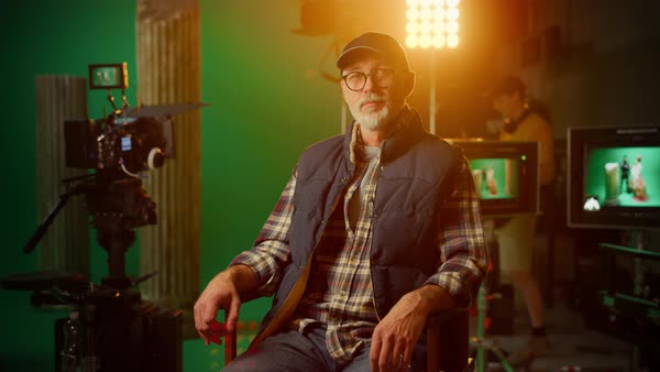 Protrait of Prominent Successful Senior Director Sitting in a Chair on ...